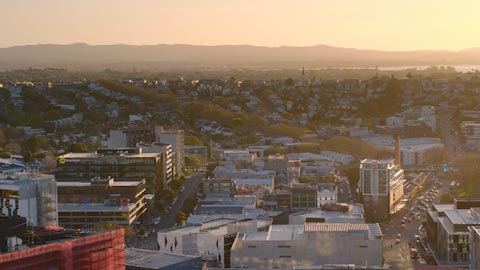 TVNZ building and a rise up over Auckland City NZ Footage