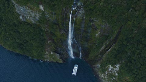 Drone Footage of Boat approaches Sutherland Falls